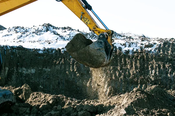 Crawler excavator. Earth-moving machine at a construction site. The ...