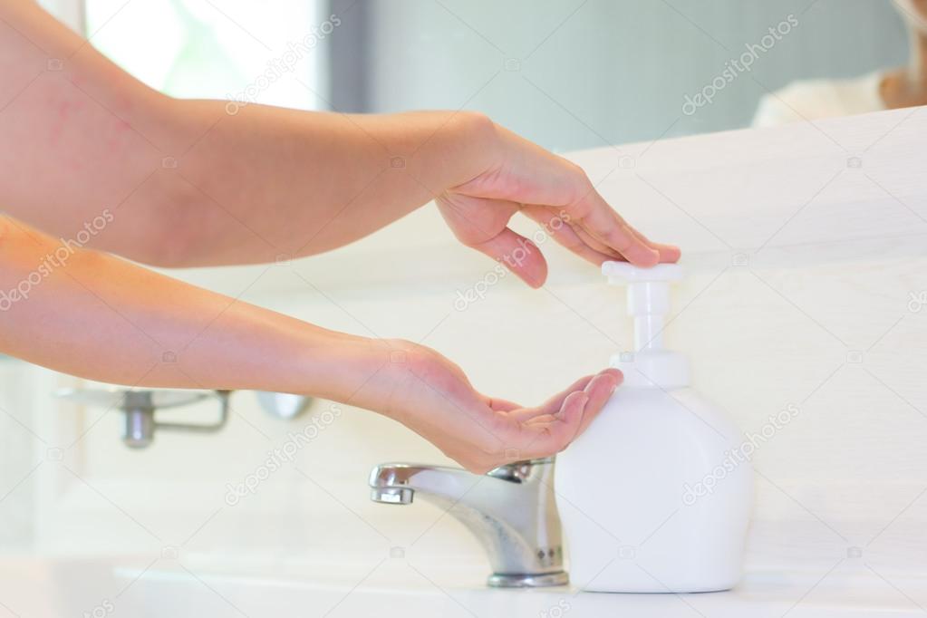 Hands applying sanitizer soap — Stock Photo © Bignai #56930799