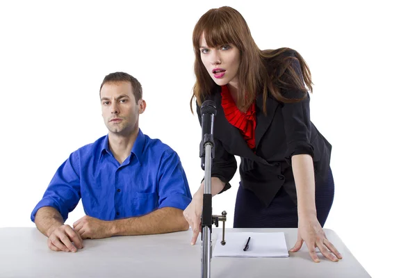 Female lawyer representing male client in a court hearing Stock Photo ...