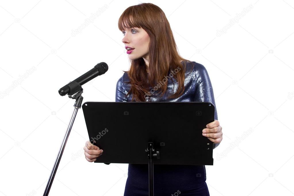 Girl speaking into a microphone Stock Photo by ©innovatedcaptures 59585357