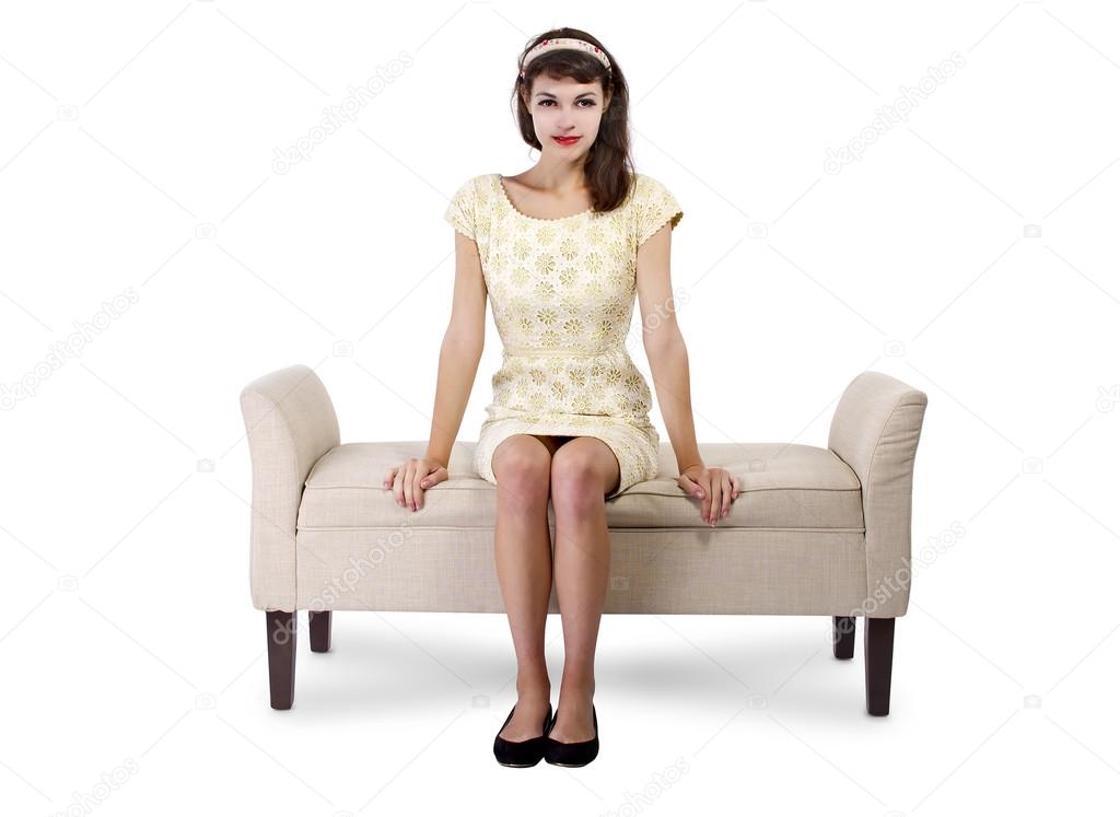 Retro woman sitting on sofa Stock Photo by ©innovatedcaptures 69723915