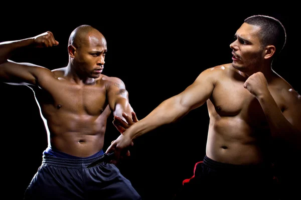 Fight instructor demonstrating self defense — Stock Photo ...