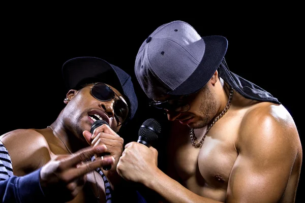 Two rappers with microphones Stock Photo by ©innovatedcaptures 81628086