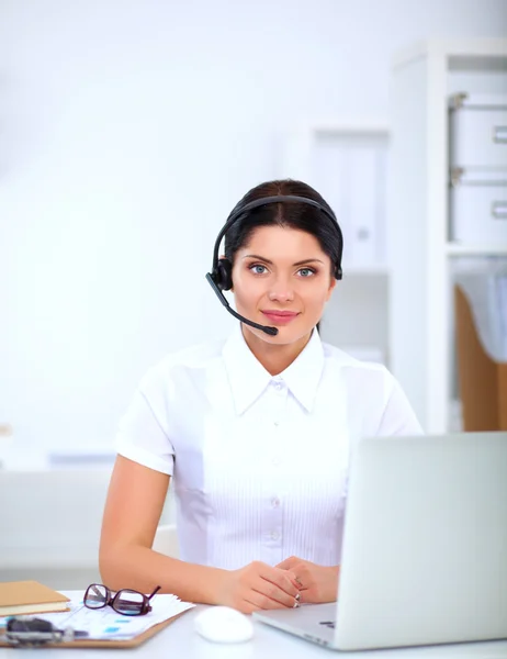 Close-up portrait of a customer service agent sitting at office - Stock ...