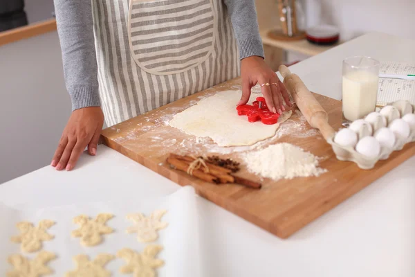 Woman is making cakes in the kitchen - Stock Image - Everypixel