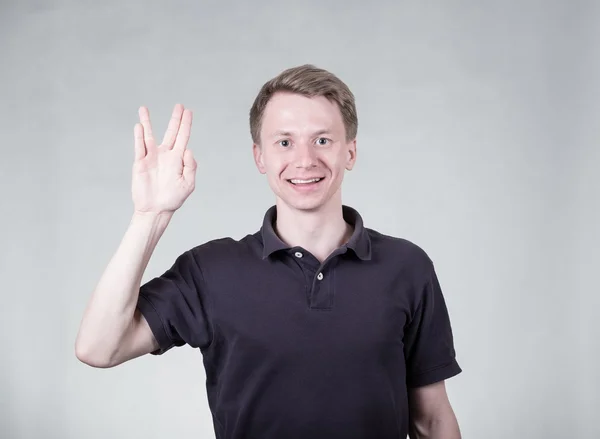 Young guy say hello Stock Photo by ©filistimlyanin 111545392