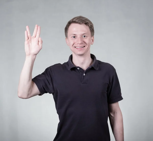 Young guy say hello Stock Photo by ©filistimlyanin 111545392