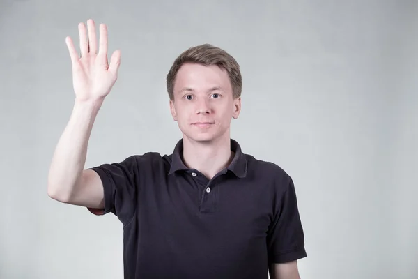 Young guy say hello Stock Photo by ©filistimlyanin 111545392