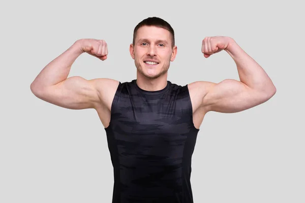 Man Showing Biceps Hands Up. Sportsman Showing Muscles. ABS, Biceps ...