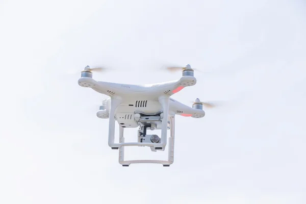 White drone quad copter with 4K digital camera. — Stock Photo © Kesu01 ...