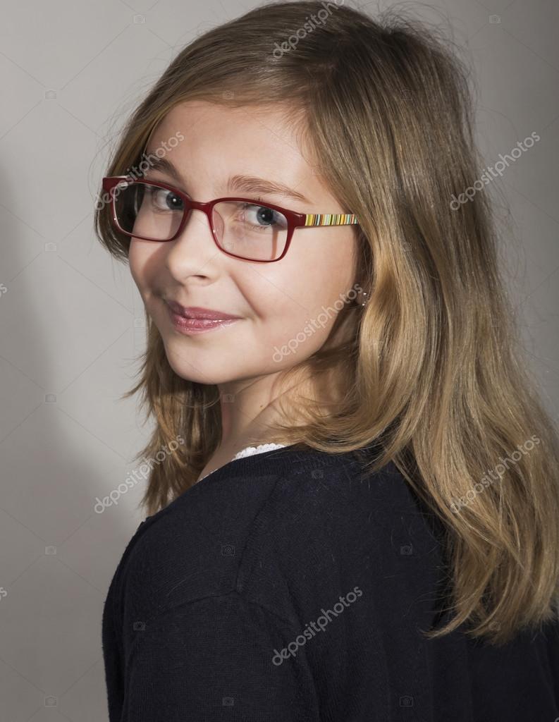 Studio portrait of beautiful young girl with blond hair, girl wearing glasses — Stock Photo ...