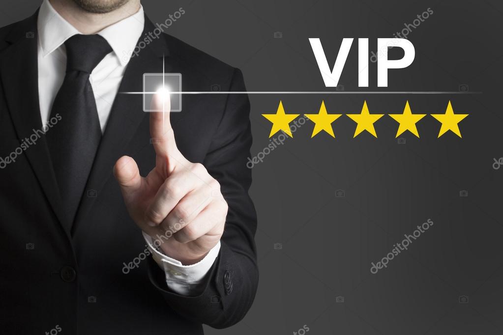 Businessman pushing button vip five stars — Stock Photo © Imilian #60107201