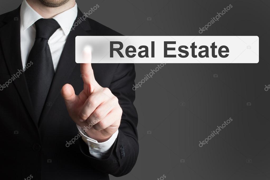 Businessman pushing flat button real estate — Stock Photo © Imilian ...