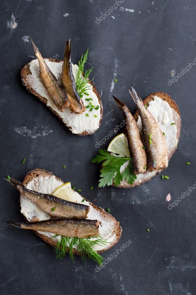 Sandwiches with sprats or sardines Stock Photo by ©Wiktory 123536322