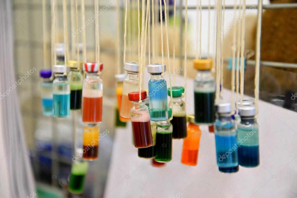 Small bottles with colorful liquids. Decorative bottles. — Stock Photo ...