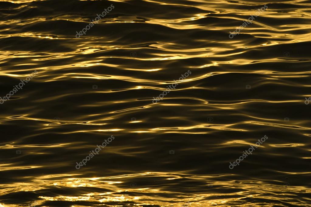 Water Ripples Gold Stock Photo by ©mexitographer 80163722