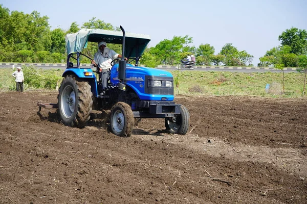 Indian Tractors In Fields