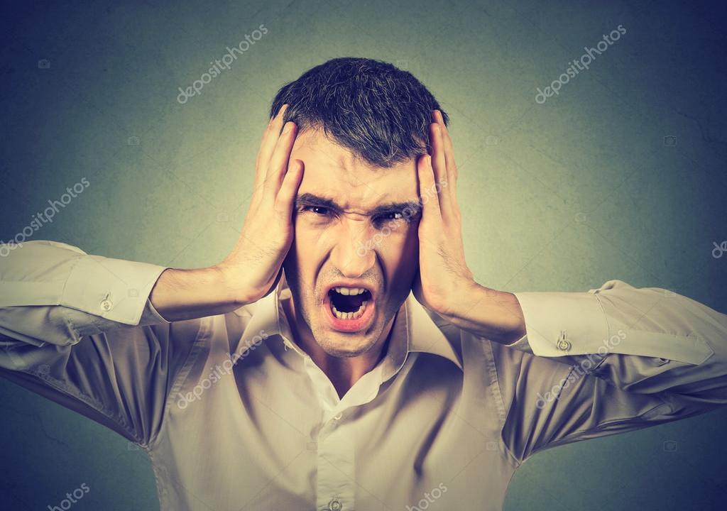 Screaming stressed frustrated young man — Stock Photo © SIphotography ...