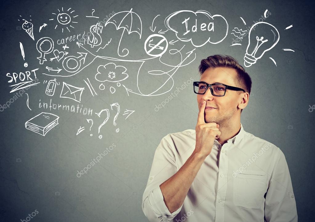 Happy man thinking dreaming has many ideas looking up Stock Photo by ...