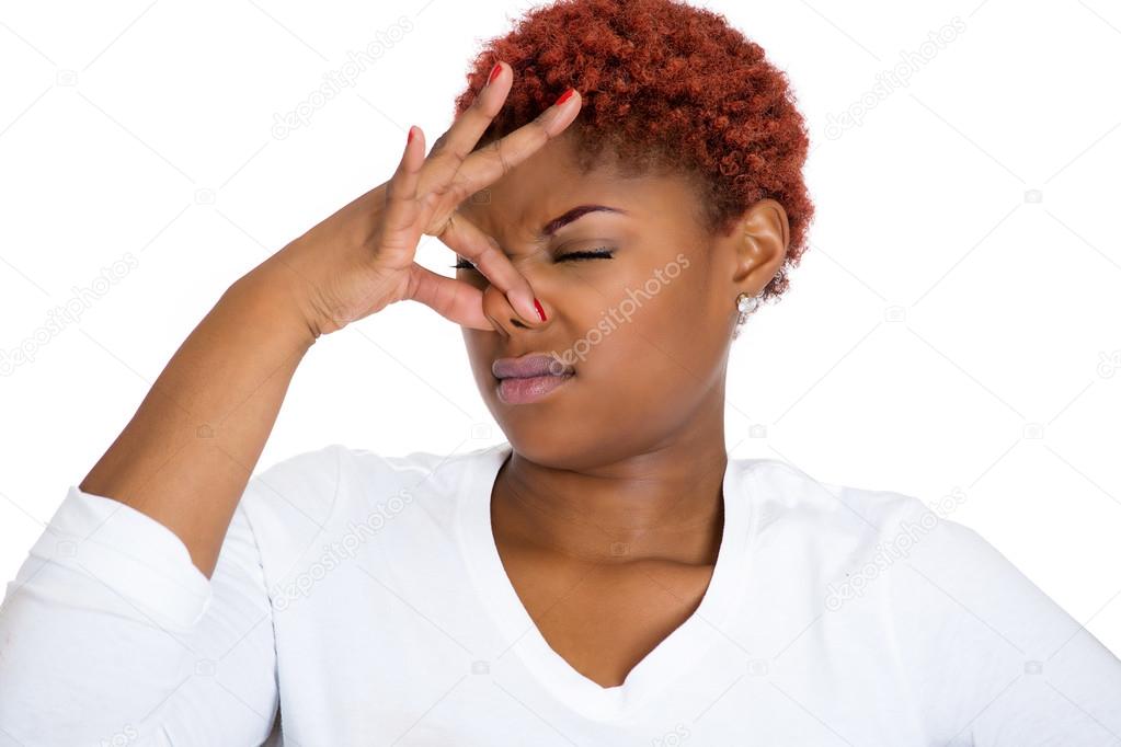 Woman, disgust on face, pinches nose, something stinks — Stock Photo ...