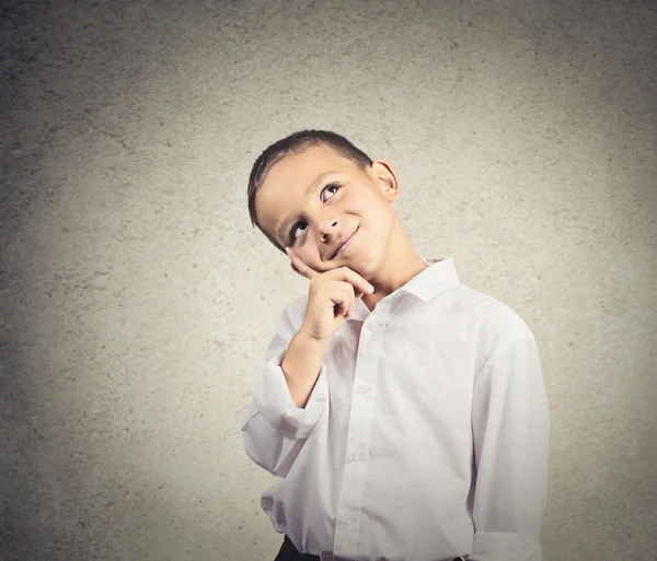 Boy thinking, daydreaming Stock Photo by ©SIphotography 50955399