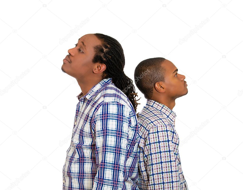 Two men, back to back, sad, disappointed with each other Stock Photo by ...