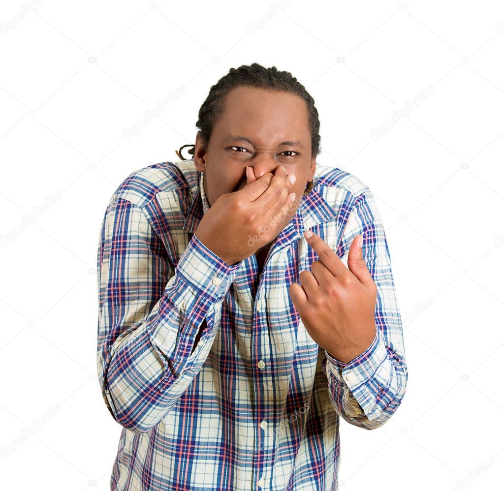 Man pinches his nose looks at you, something stinks Stock Photo by ...