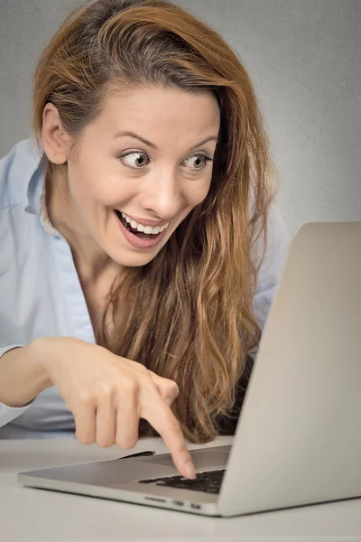 Funny woman working on computer ready to press enter button - Stock ...
