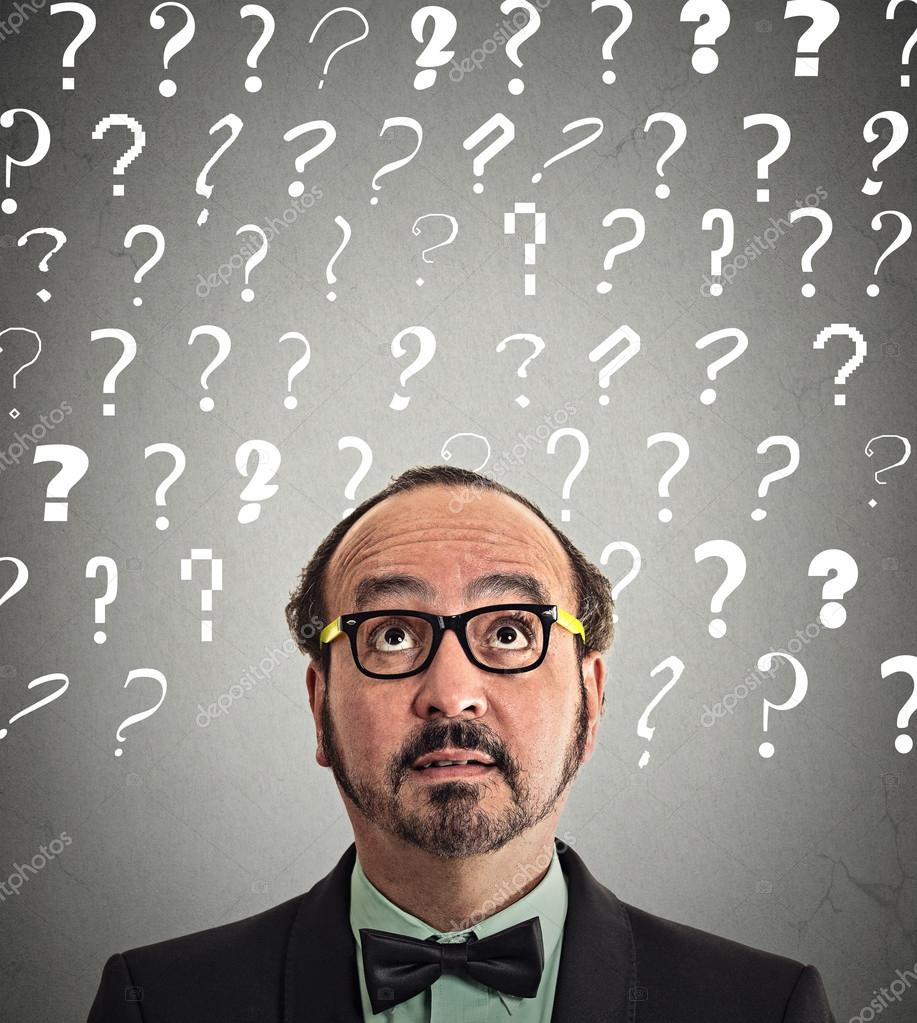 Man puzzled question marks above head Stock Photo by ©SIphotography ...