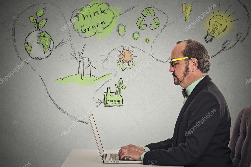 Man working on computer solving ecology problem Stock Photo by ...