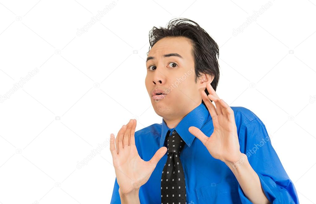 Man looking shocked scared trying to protect himself from unpleasant ...