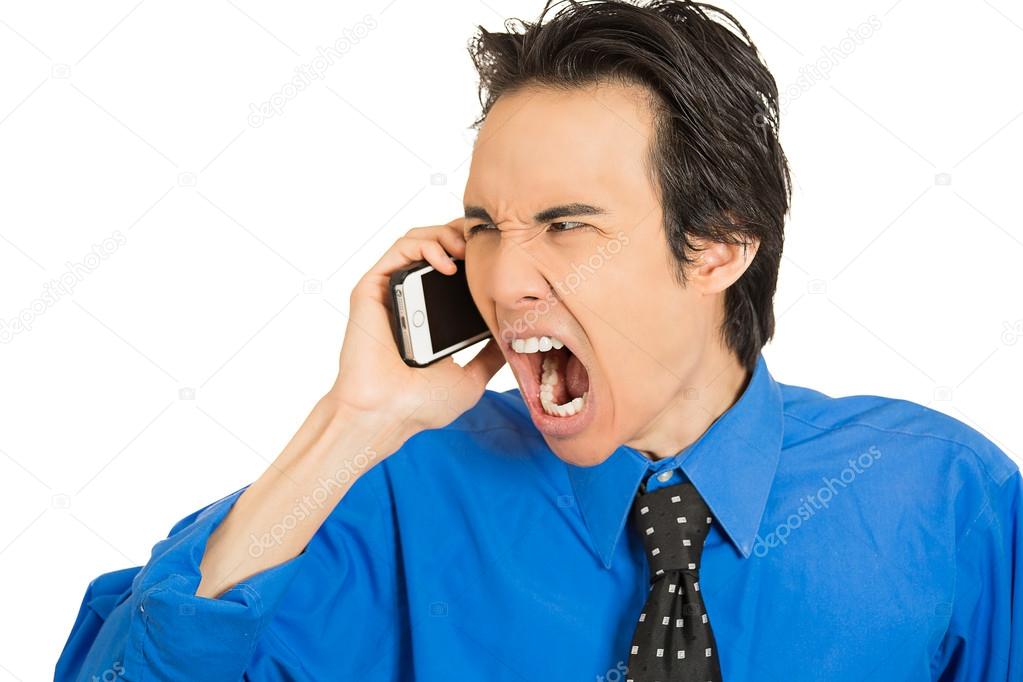 Angry young man shouting while on phone Stock Photo by ©SIphotography ...