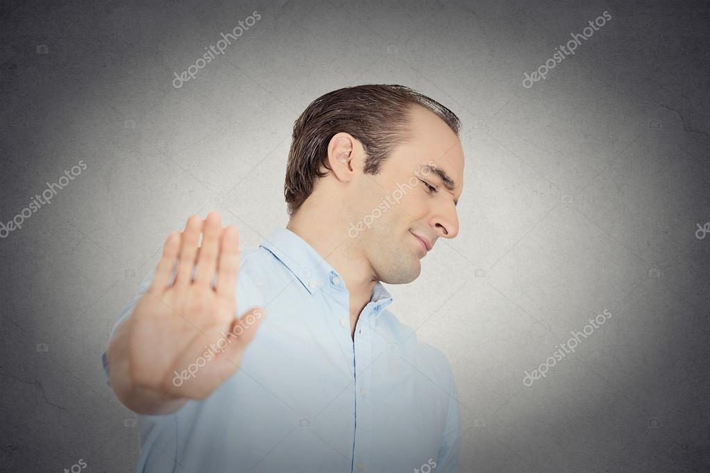 Grumpy man with bad attitude giving talk to hand gesture — Stock Photo ...