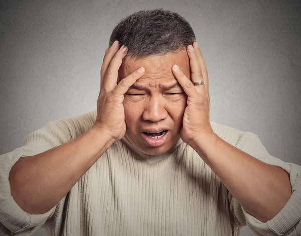 Desperate stressed middle aged man Stock Photo by ©SIphotography 108898116