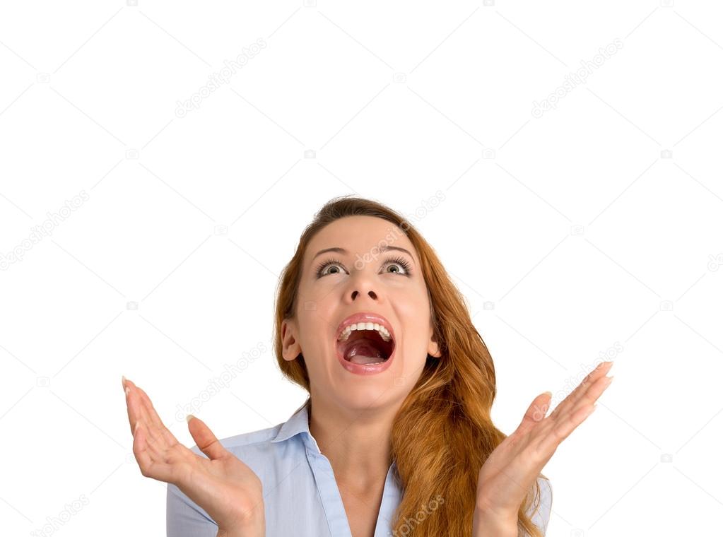 Surprised beautiful woman looking up Stock Photo by ©SIphotography 62285577