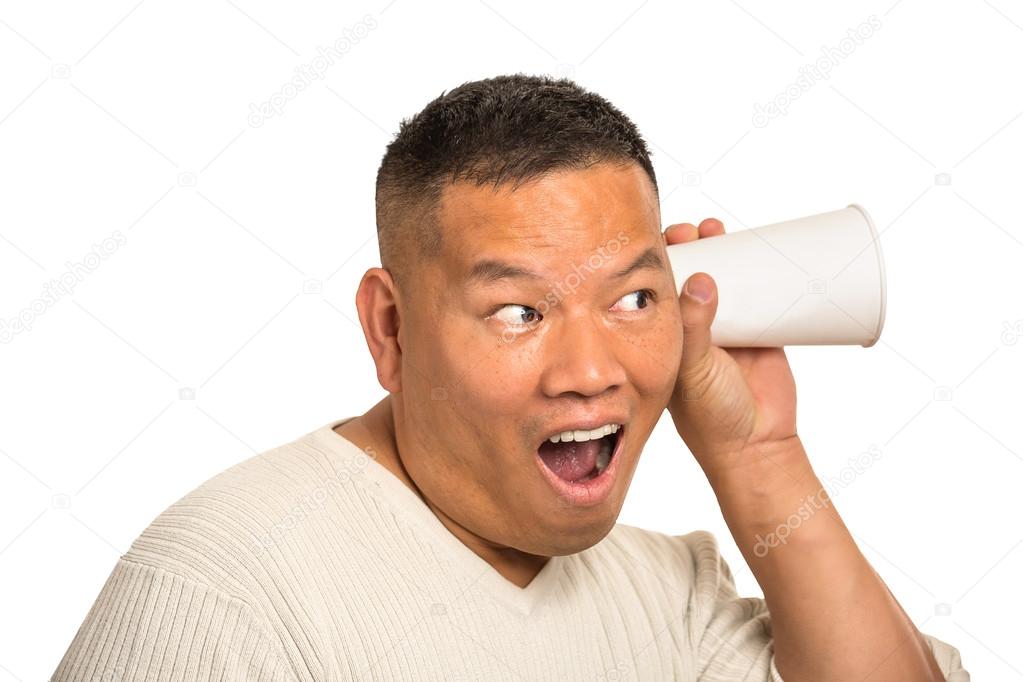 Funny looking curious surprised man listening to conversation Stock ...