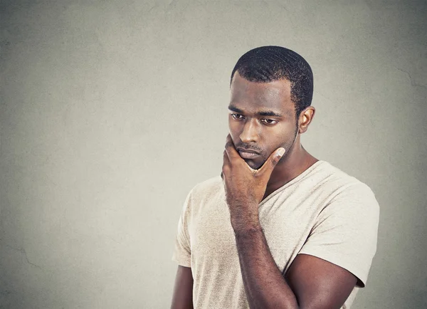 Sad, depressed, worried young man looking up Stock Photo by ...