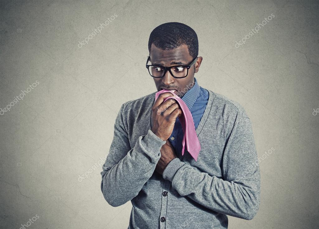 Portrait geeky nervous anxious man bitting chewing his tie — Stock ... Portrait geeky nervous anxious man bitting chewing his tie — Stock ...
