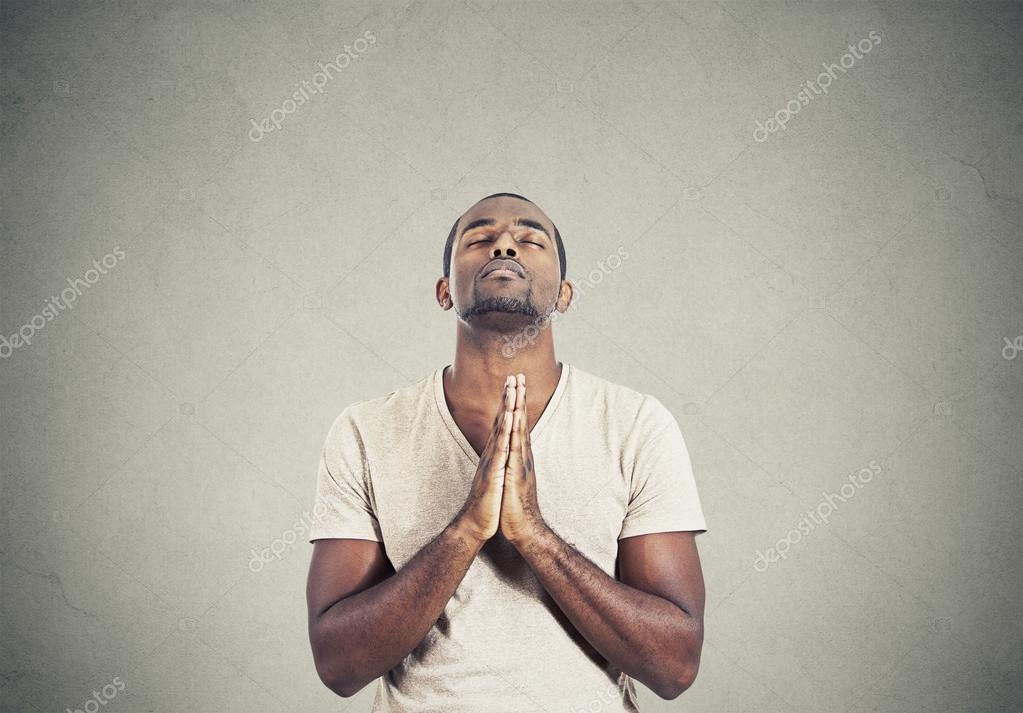 Man praying hands clasped hoping for best Stock Photo by ©SIphotography ...