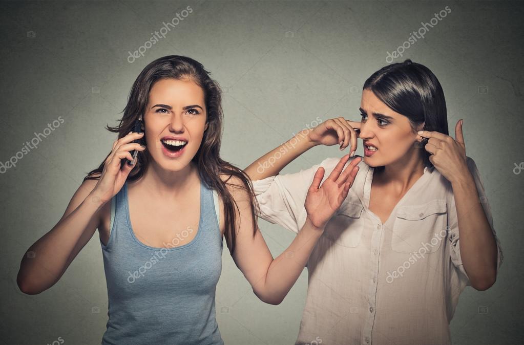 Two women loud, obnoxious rude woman talking loudly on cell phone ...