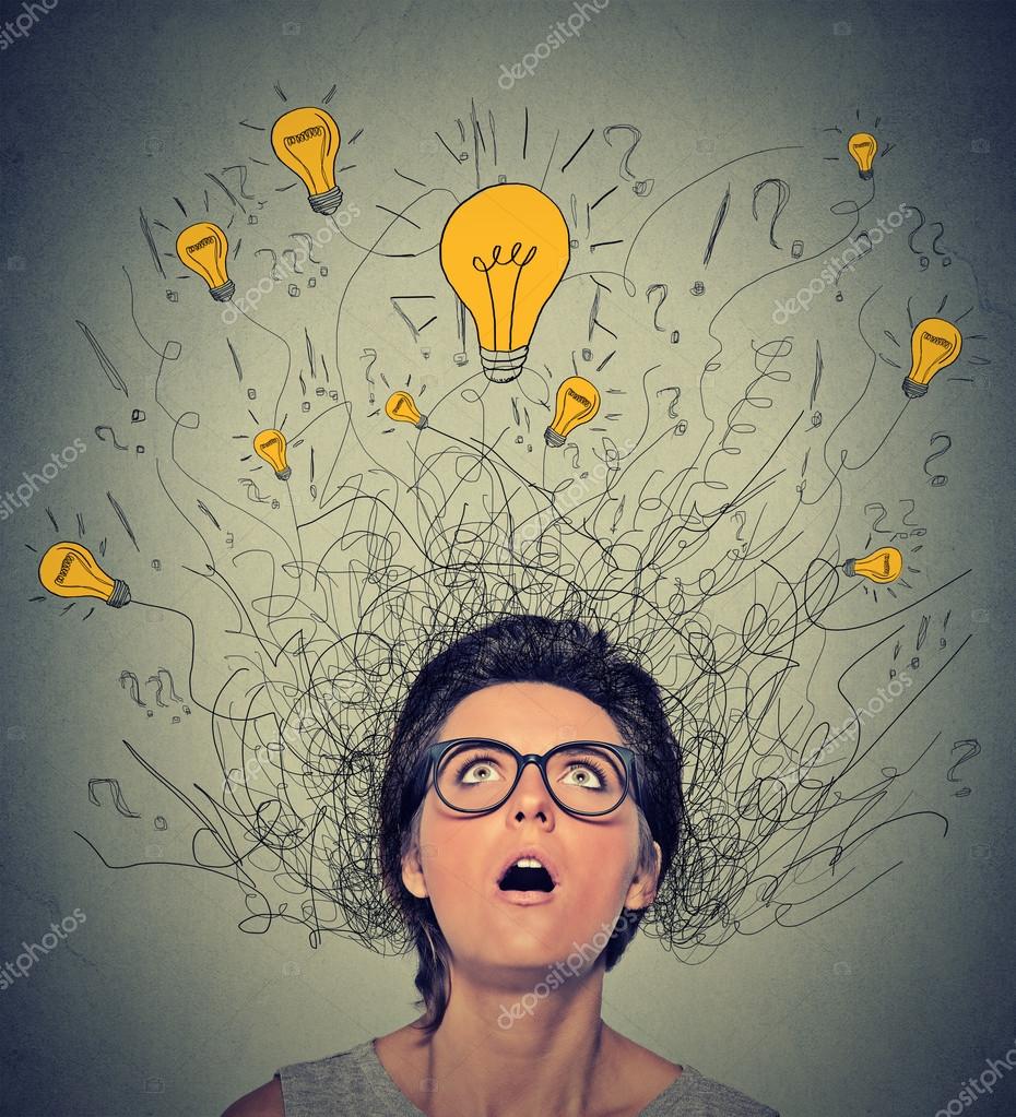 Thinking woman with question signs and light idea bulb above head ...