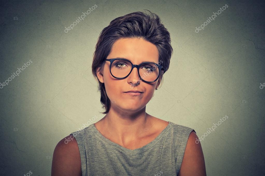 Skeptic. Doubtful woman in glasses looking at you — Stock Photo ...