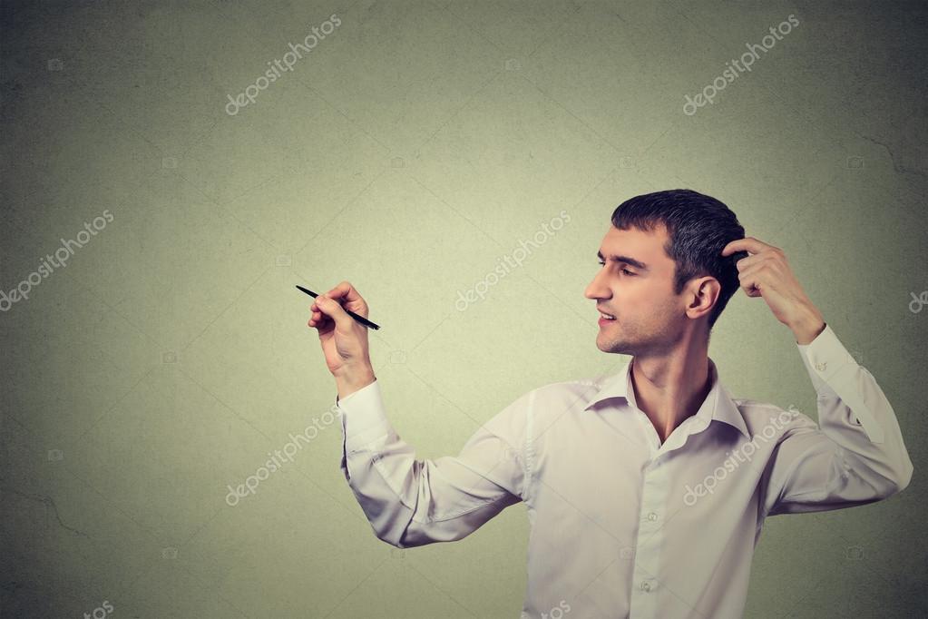 Portrait young creative man drawing, template for illustration on gray ...