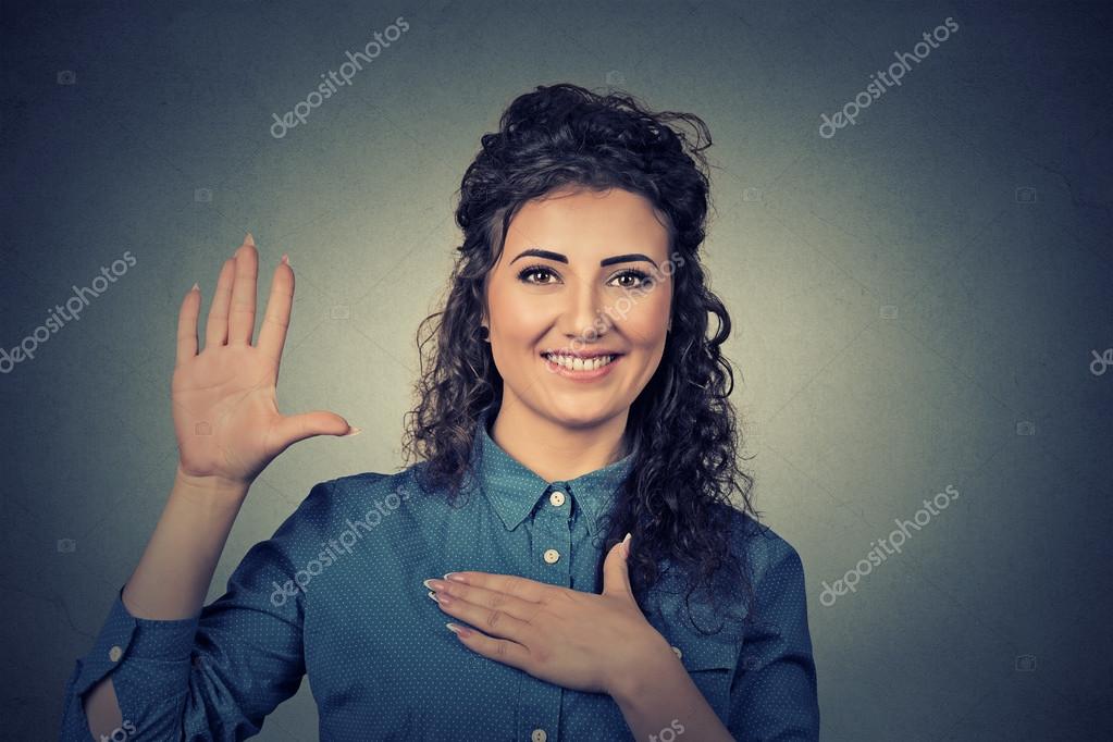 Young woman making a promise — Stock Photo © SIphotography #98355722