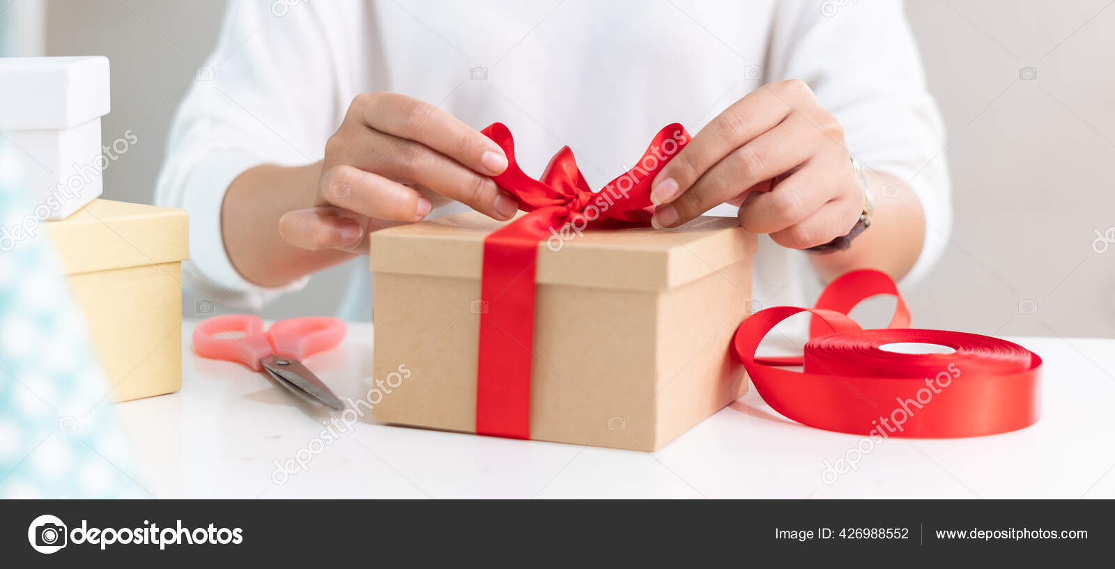 Closeup Hand Making Present Gift Box Red Ribbon Christmas Birthday ...