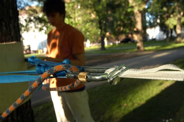 slacklining or walking on a tightrope, balancing on a rope - Stock ...