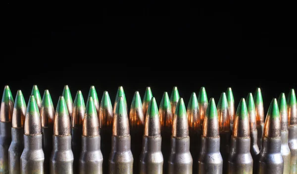 Bullets with green tips Stock Photo by ©gsagi 122565804