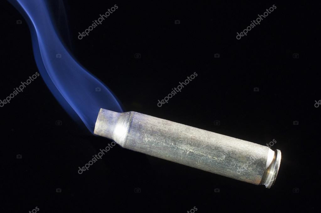 Hot rifle shell Stock Photo by ©gsagi 122414544