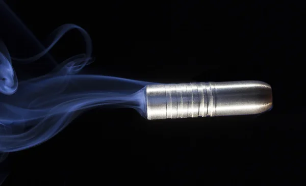 Bullet with smoke behind Stock Photo by ©gsagi 121989732