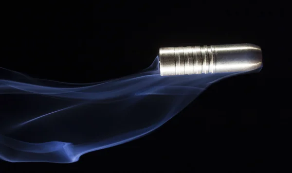 Bullet with smoke behind Stock Photo by ©gsagi 121989732